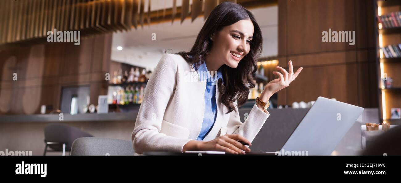 Smiling freelancer gesturing typing hi-res stock photography and images ...