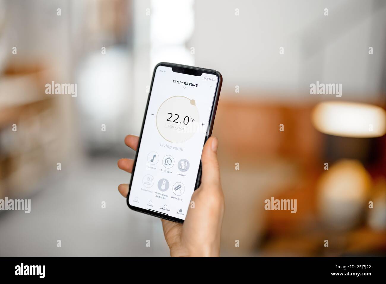 Smartphone with launched application for temperature adjustment Stock ...