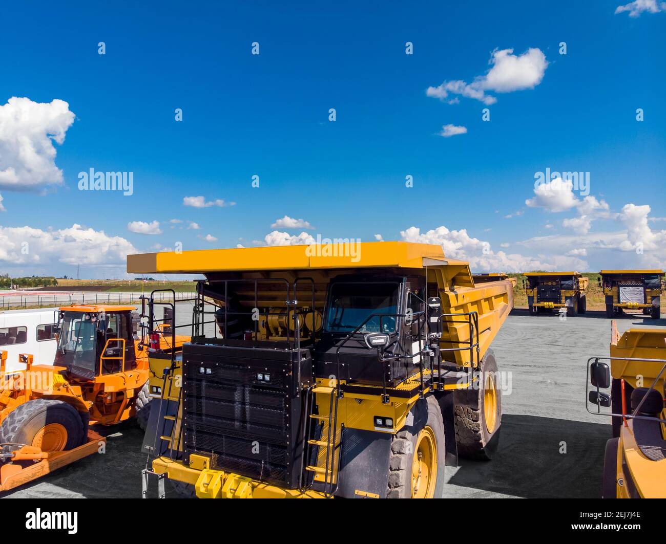 Banner parking open pit mine industry, big yellow mining truck for coal ...