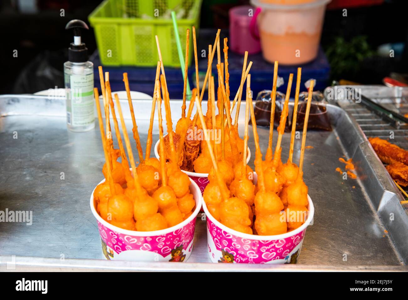Golden brown fried chicken and fish balls await hungry patrons in the ...
