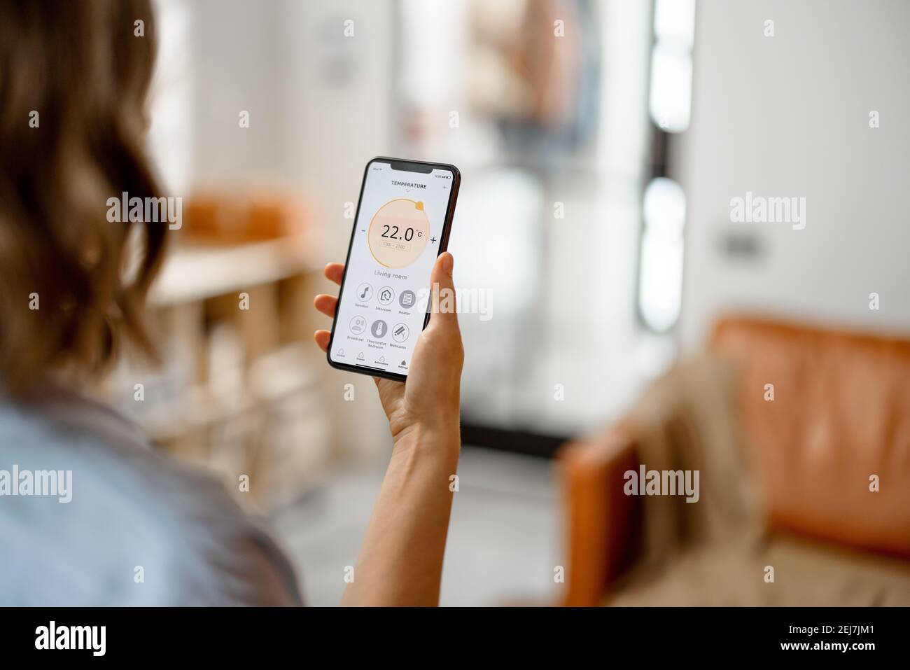 Smartphone with launched application for temperature adjustment Stock ...