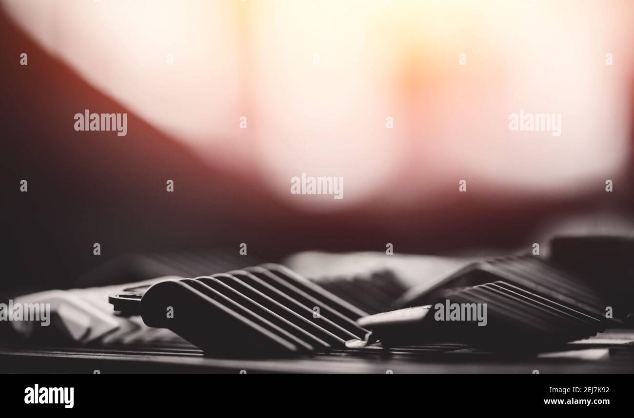 Hair clipper in men barbershop salon, dark background toning Stock ...