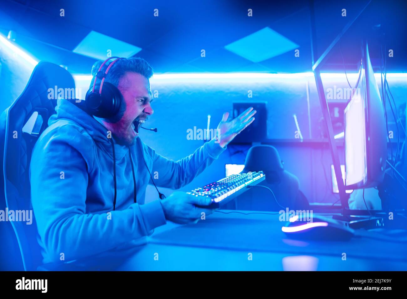 Streamer young man angry screams defeat professional gamer playing ...