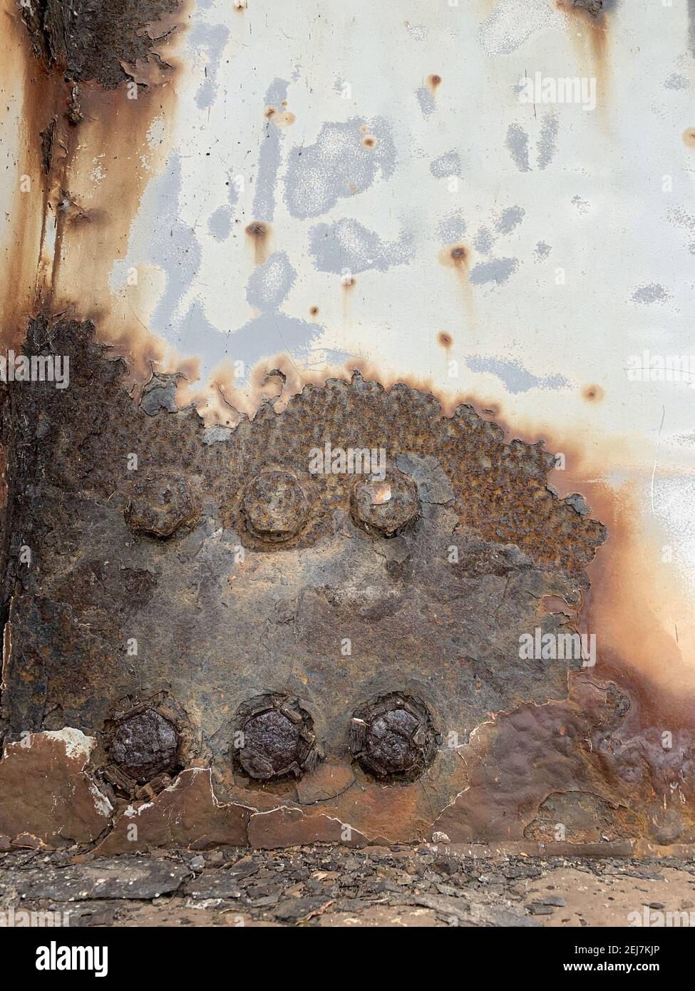 Vertical shot of colorful oxidized metal texture from a railroad train ...