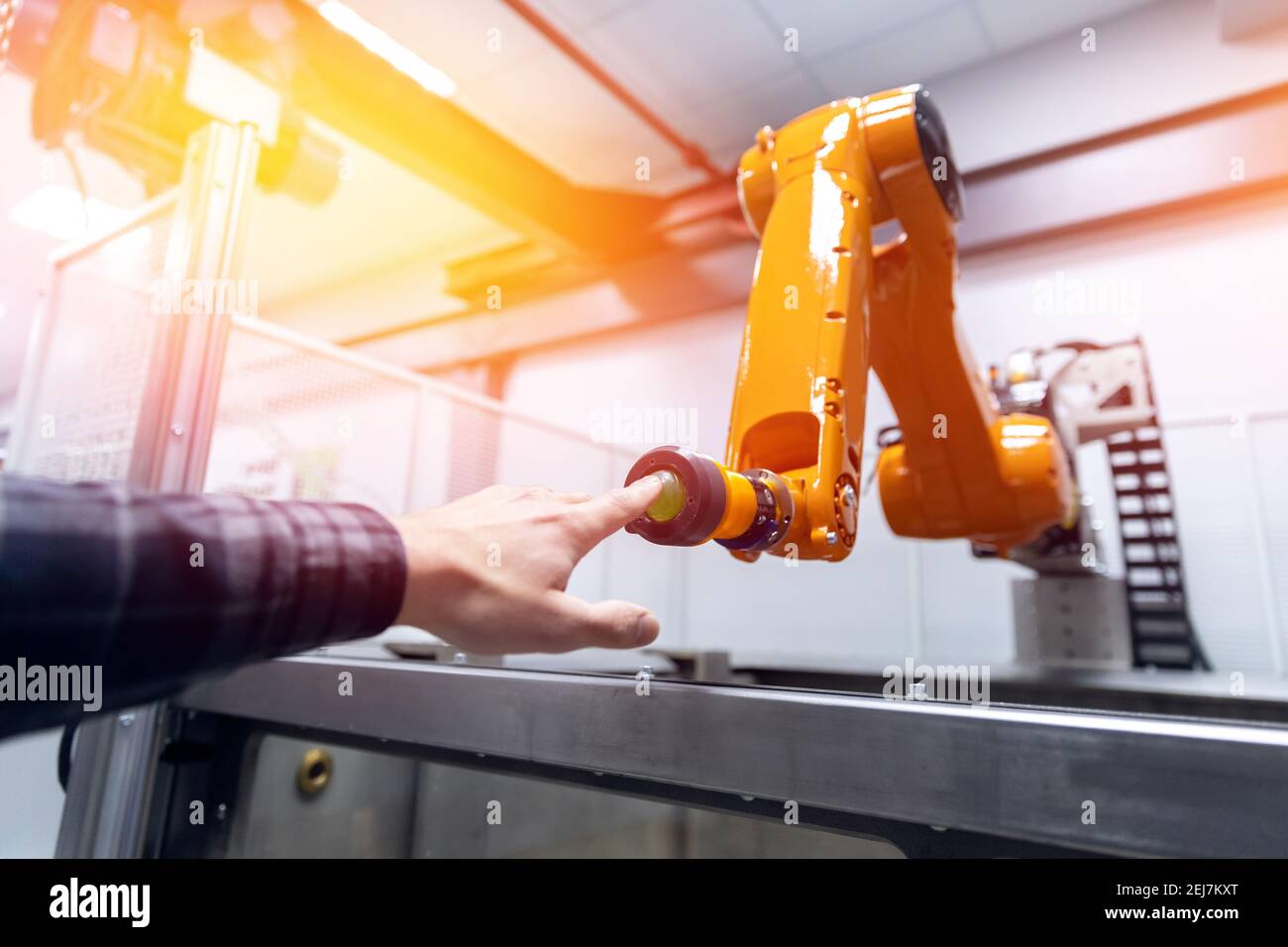 Cyber communication futuristic touches robot arm human operator hand in ...