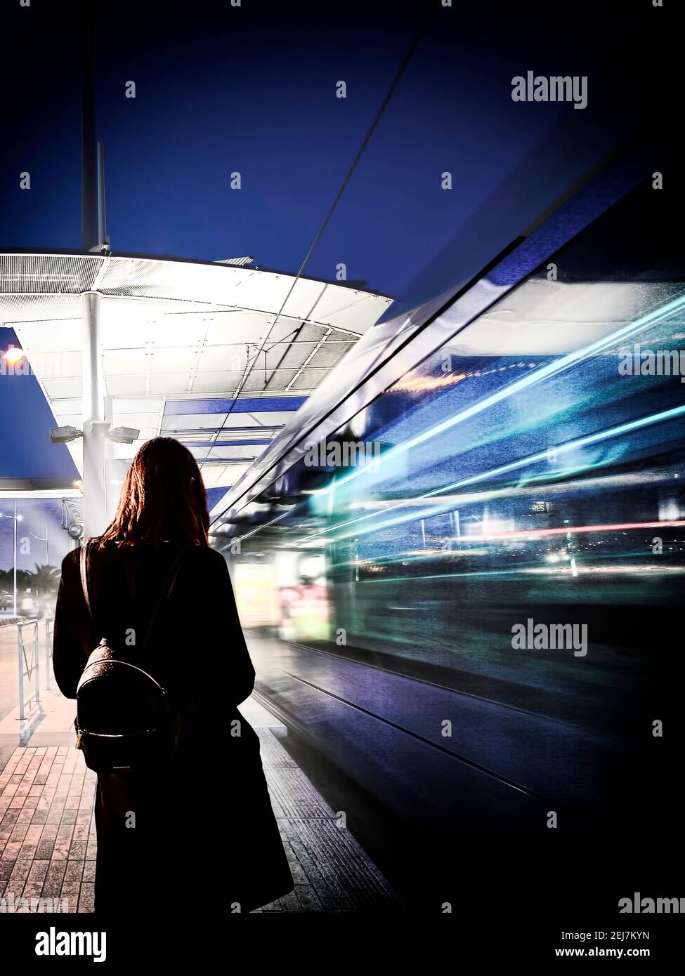 Train leaving woman hi-res stock photography and images - Alamy