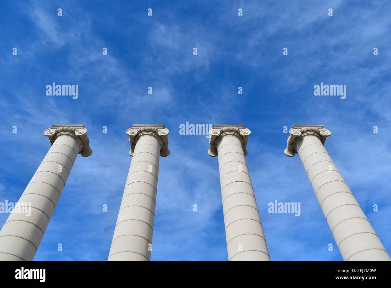 Low angle shot of the Four Columns and a beautiful blue sky in ...