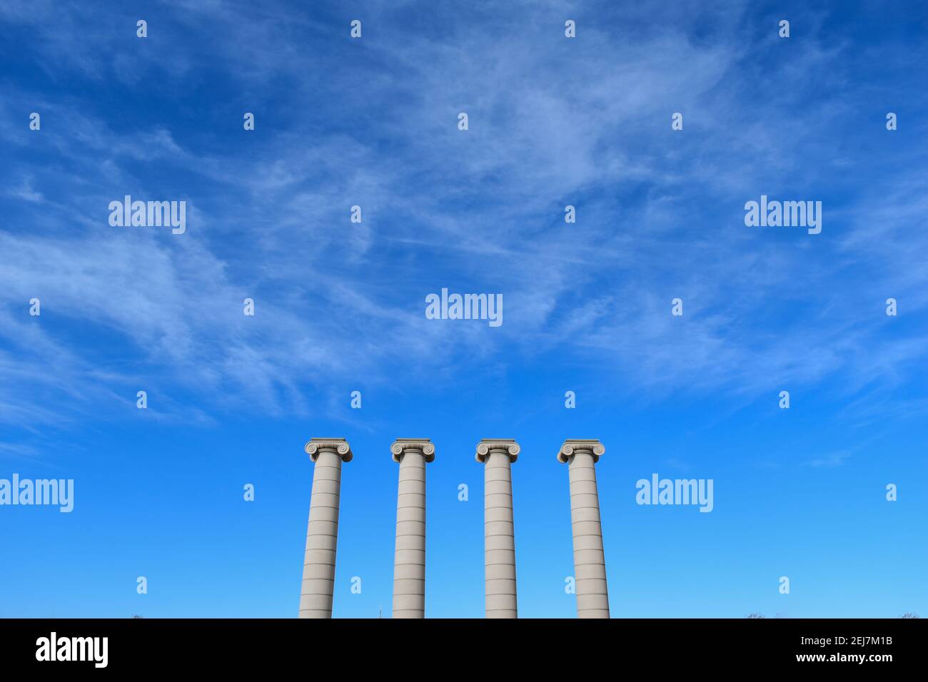 Four Columns and a beautiful blue sky in Barcelona, Spain Stock Photo ...