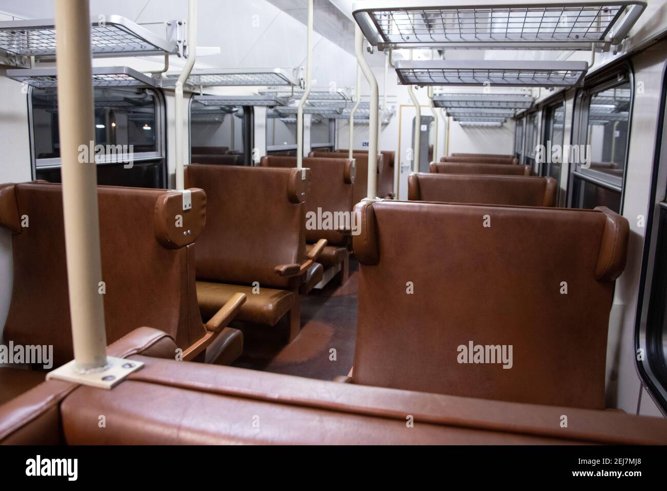 Beautiful view of old European train with empty chairs Stock Photo - Alamy