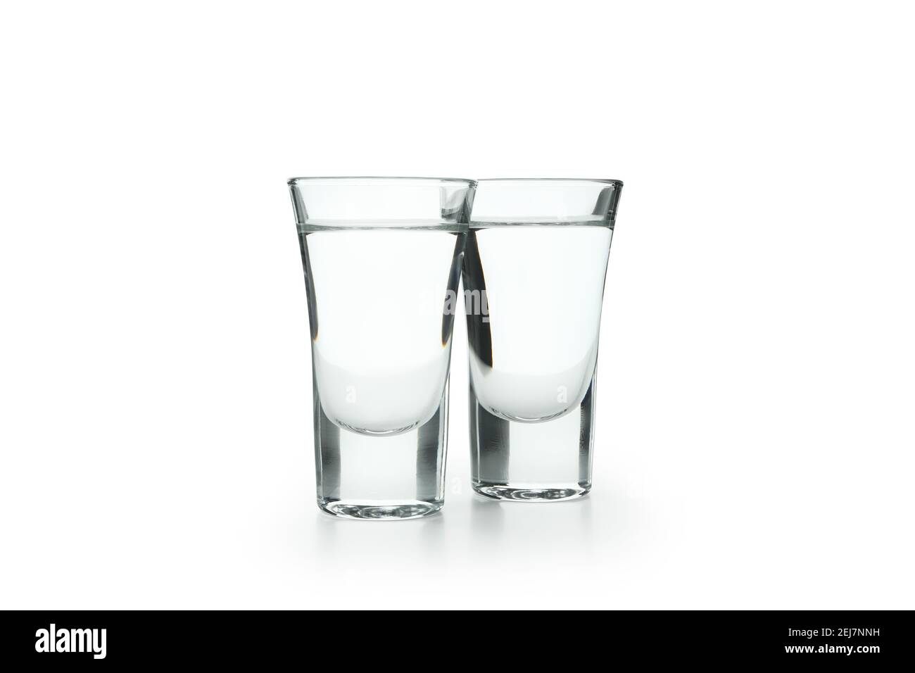 Shots of vodka isolated on white background Stock Photo - Alamy