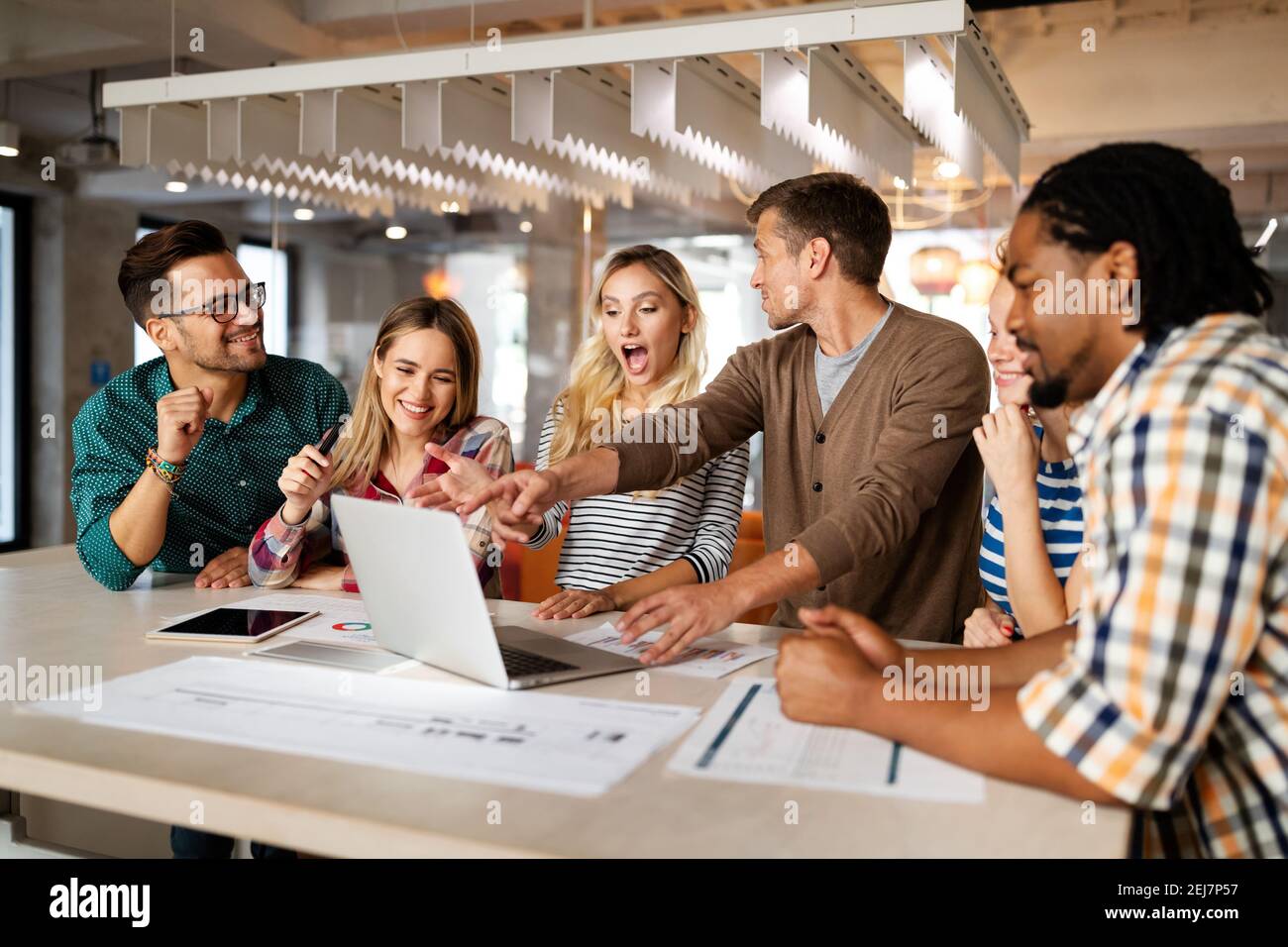 Successful group of designers, business people at work in office Stock ...