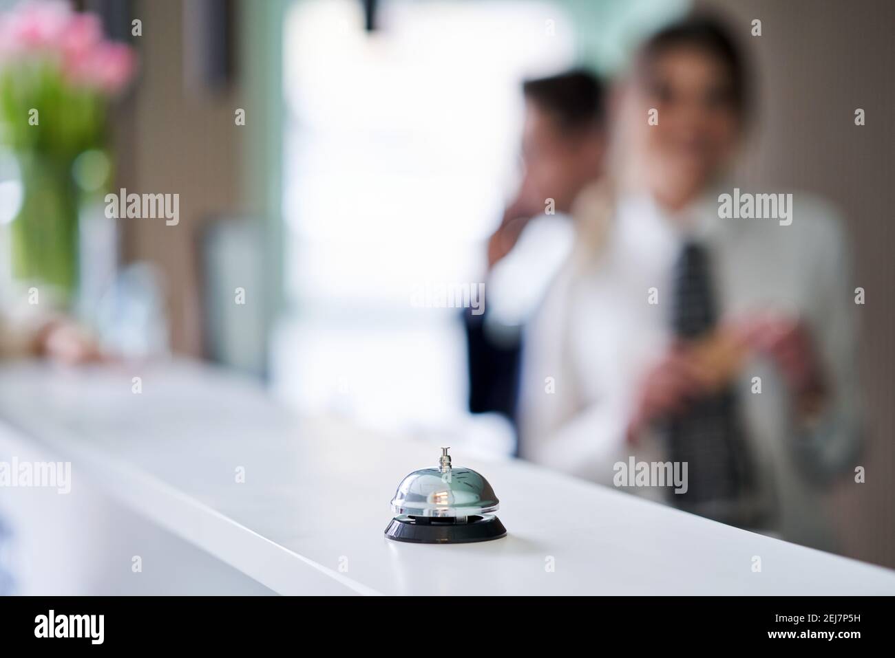 Young female hotel receptionist hi-res stock photography and images - Alamy