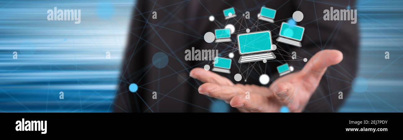 Devices connection concept above the hand of a man in background Stock ...