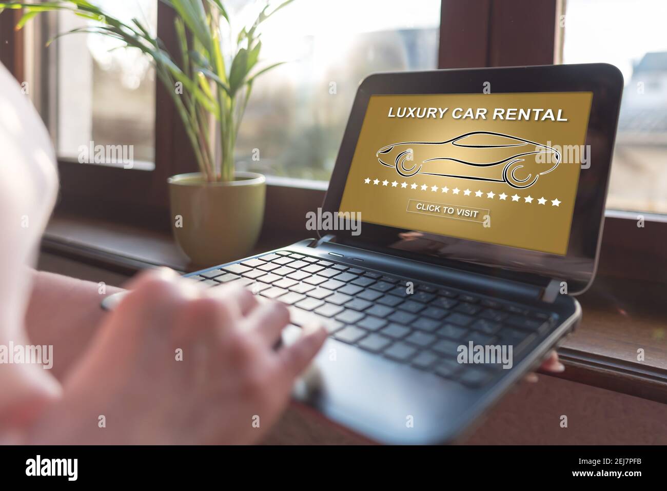 Laptop screen displaying a luxury car rental concept Stock Photo - Alamy