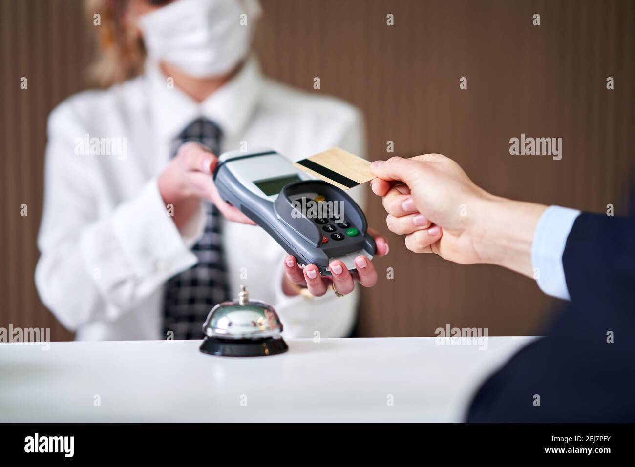 Receptionist working in a hotel Stock Photo - Alamy