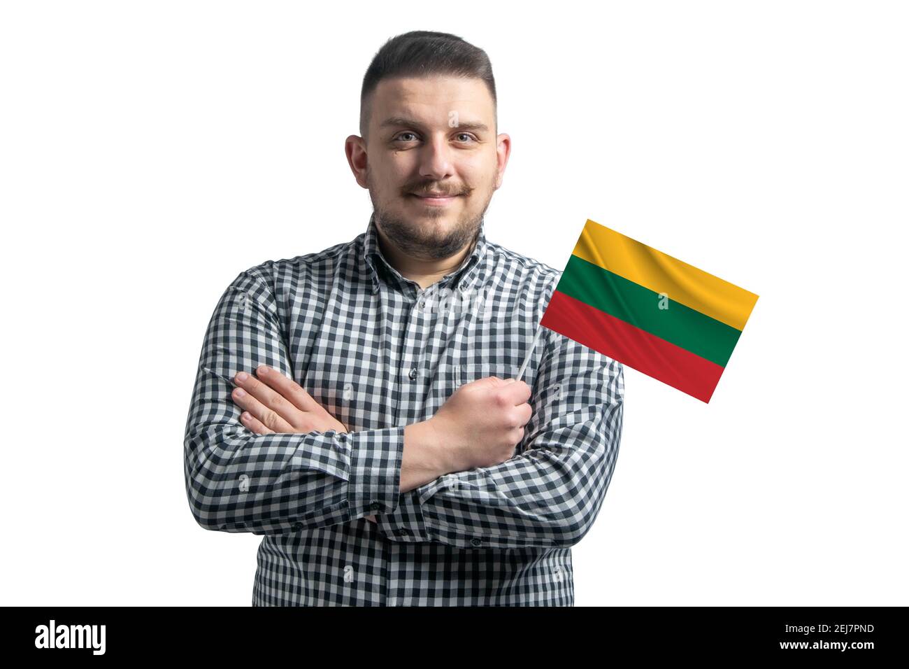 White guy holding a flag of Lithuania smiling confident with crossed ...