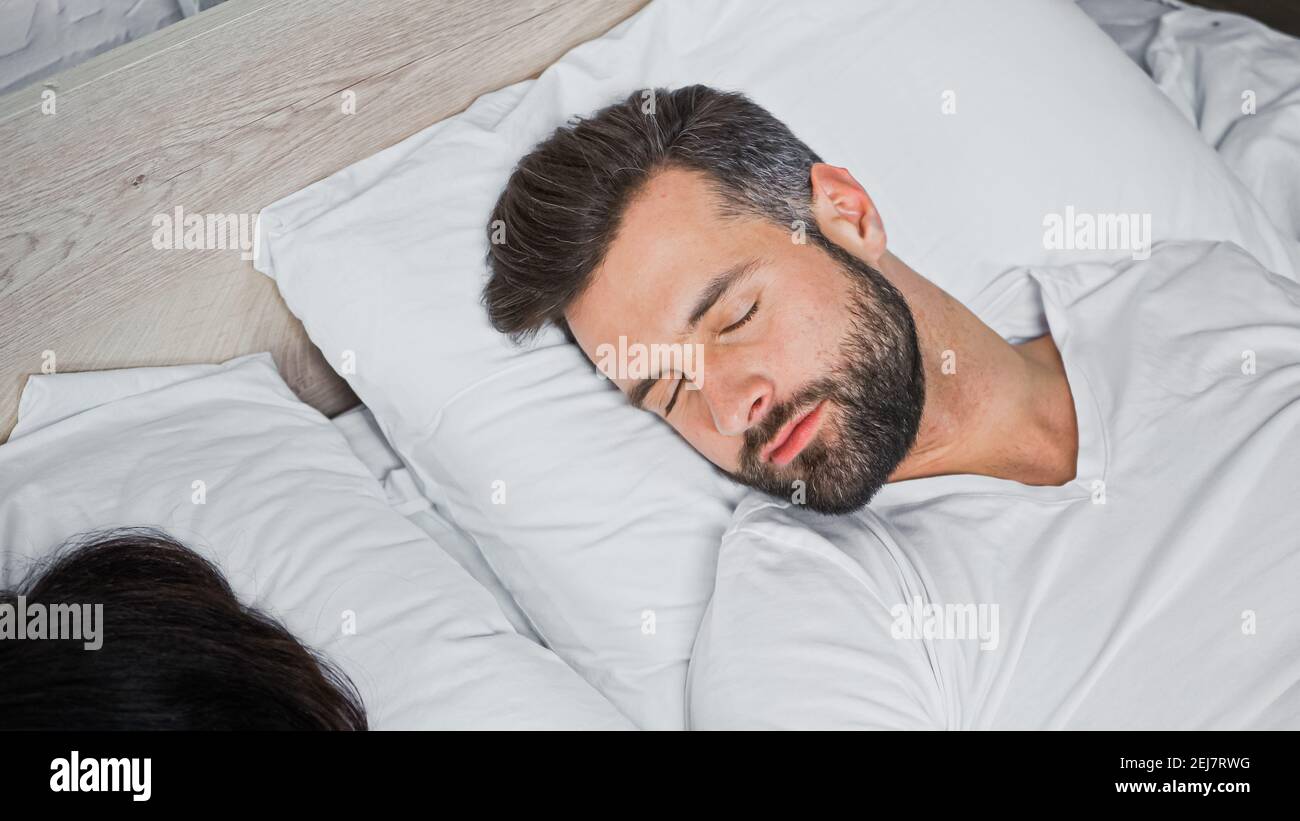 Bearded sleeping man hi-res stock photography and images - Alamy