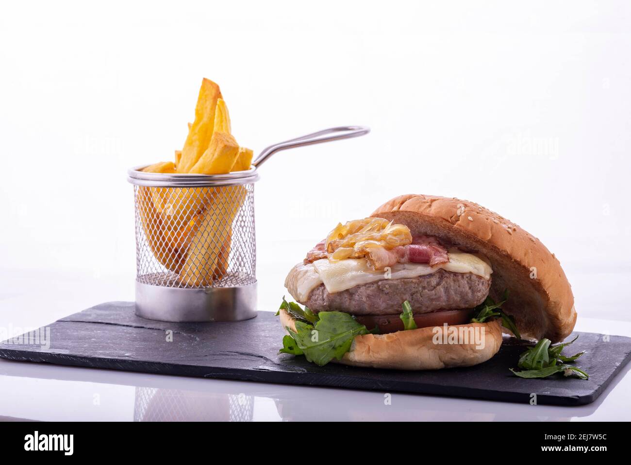 Beef burger with bacon and fries Stock Photo - Alamy