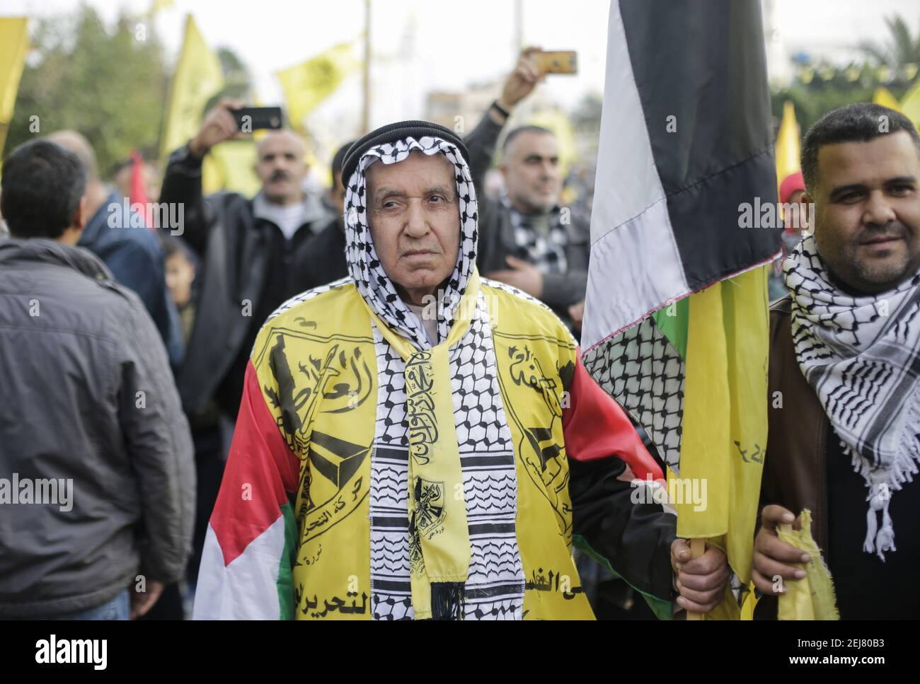 Palestinian elder in a Yasser Arafat signature scarf during a rally ...