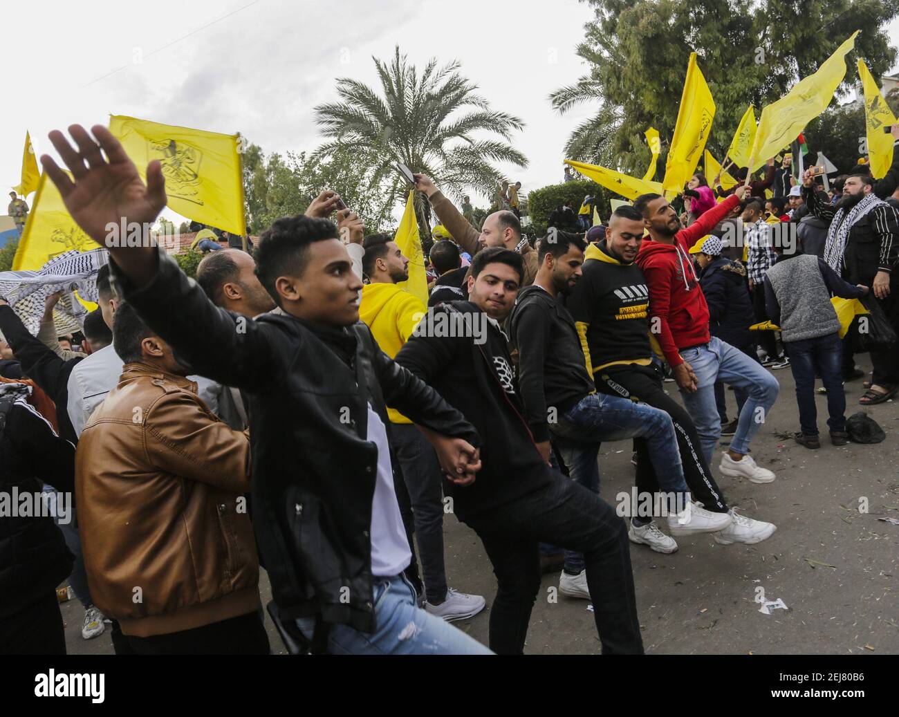 Palestinians celebrating during a rally marking the 55th anniversary of ...
