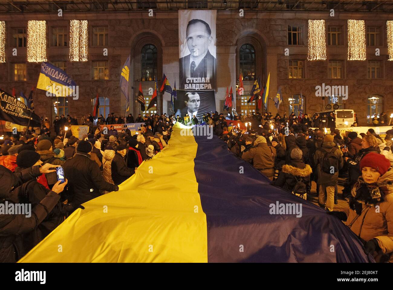 Ukrainian far-right activists with a huge flag during the march ...