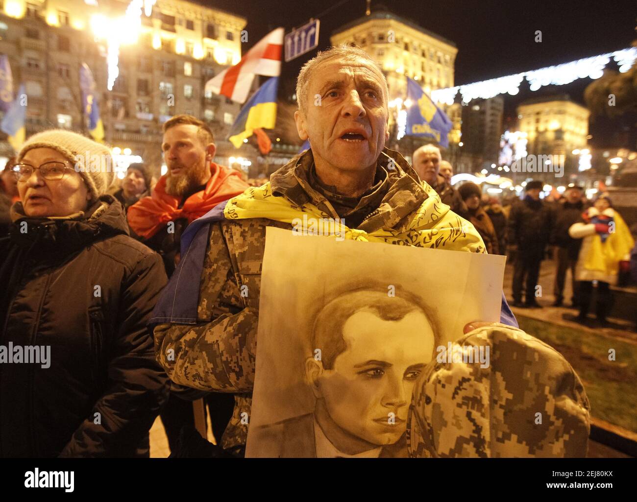 Ukrainian far-right activist with a portrait of Stepan Bandera during ...
