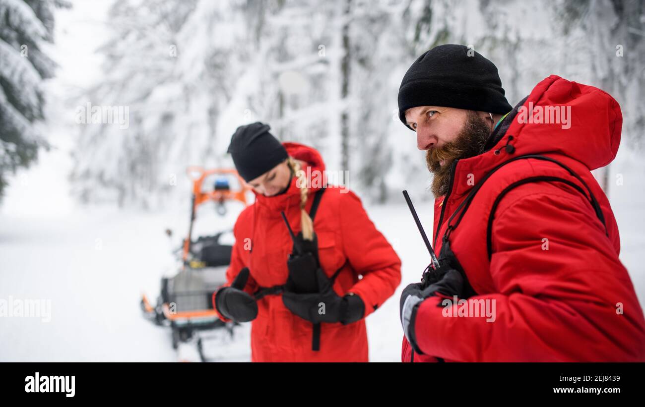 Paramedics from mountain rescue service provide operation outdoors in ...