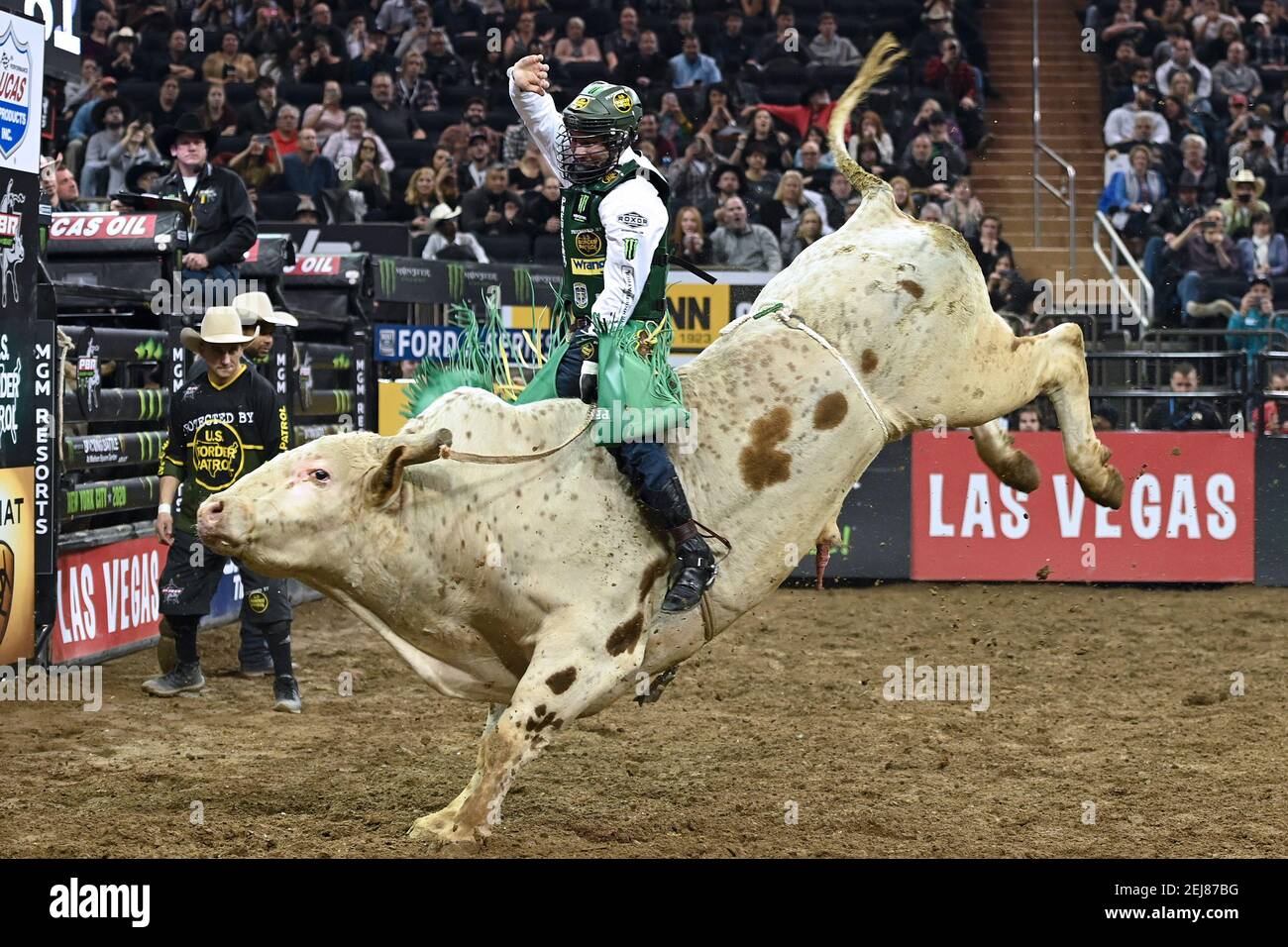 Professional bull rider Jess Lockwood rides ”Birthday Cake” during ...