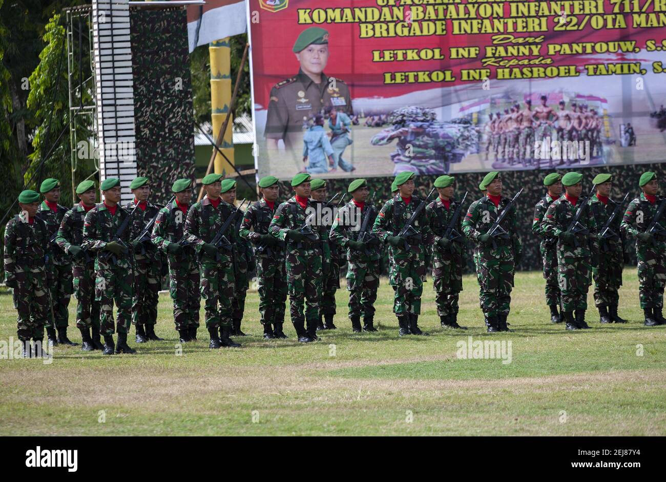 Soldiers stand on guard during the ceremony in Palu City. Soldiers of ...