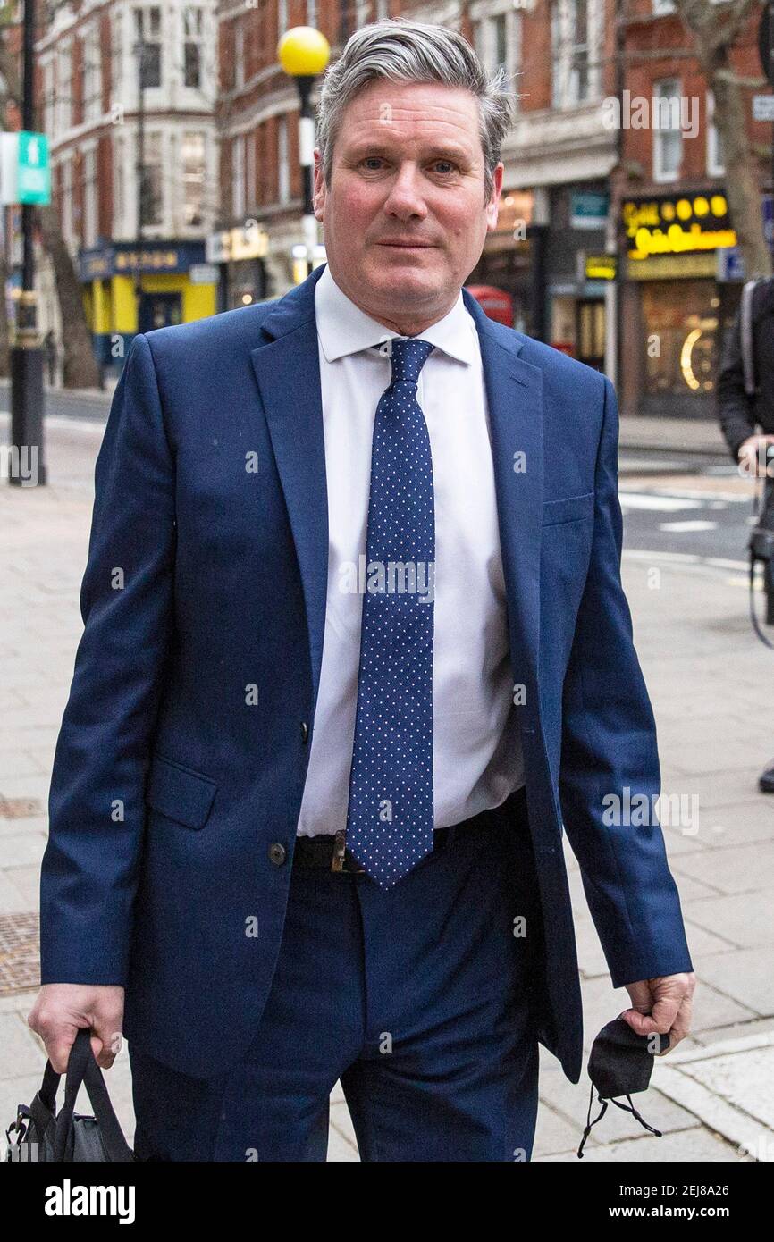 Sir Keir Starmer wearing a mask, leaves LBC's radio studio in Leicester ...