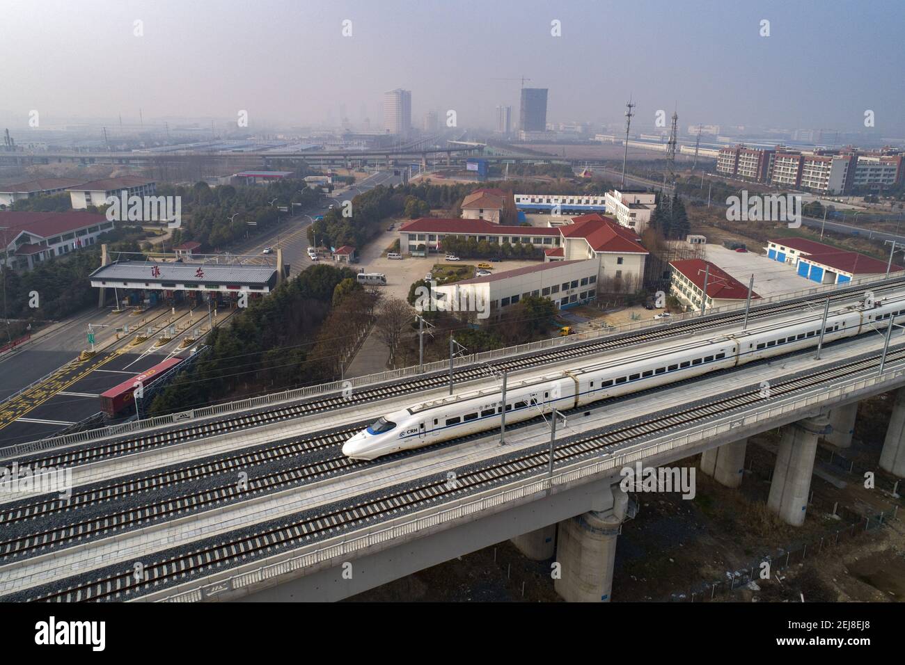 A CRH (China Railway High-speed) bullet train travels on a high-speed ...