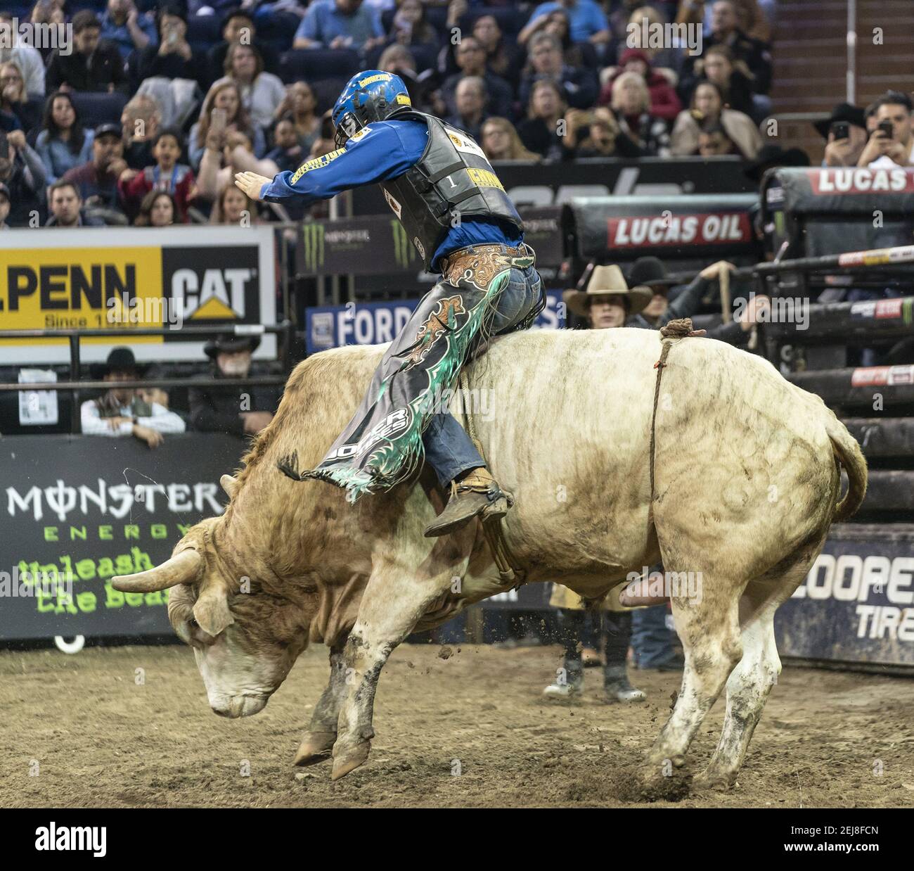 Kaique Pacheco rides bull during second round of Professional Bull ...