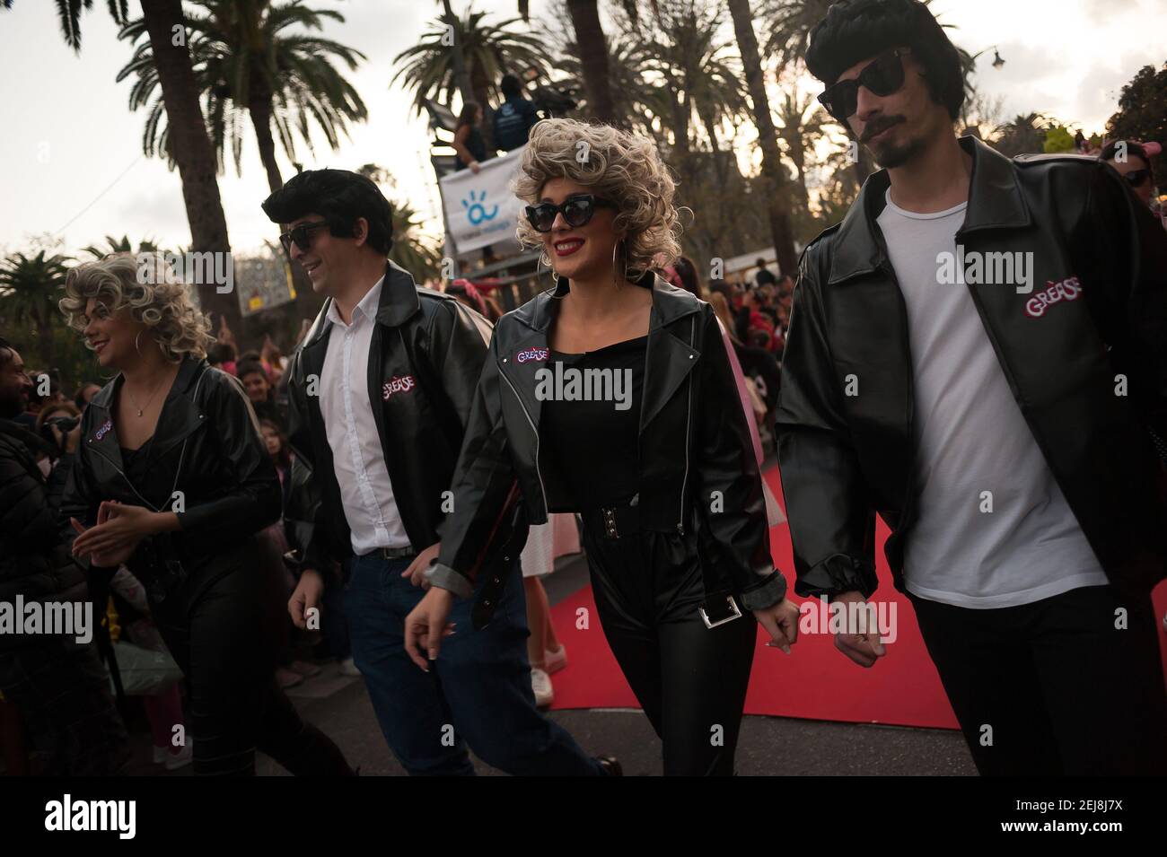 A group of people dressed as characters of the film 'Grease' perform on ...