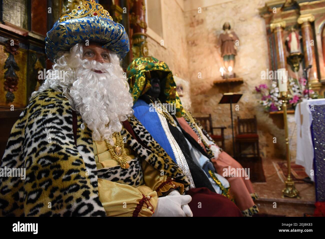 A performer dressed as Gaspar King is seen inside a church during the ...