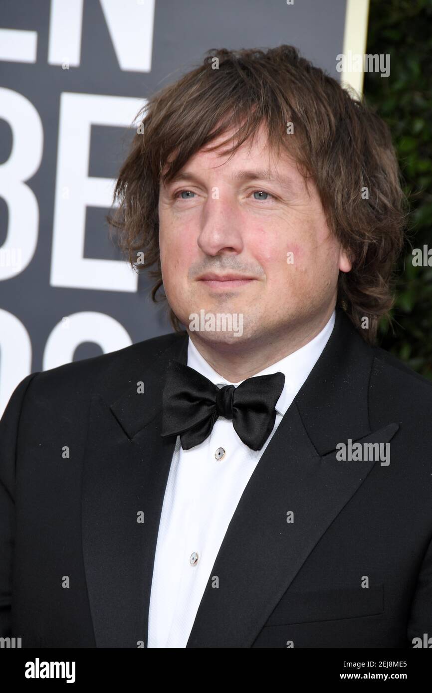 Daniel Pemberton arrives at the 77th Golden Globe Awards held at The ...