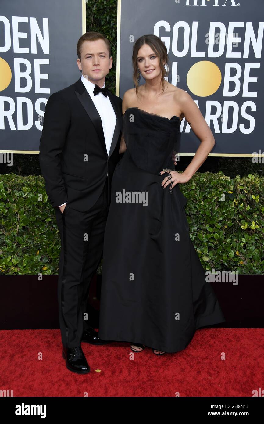 Taron Egerton and Emily Thomas arrives at the 77th Golden Globe Awards ...