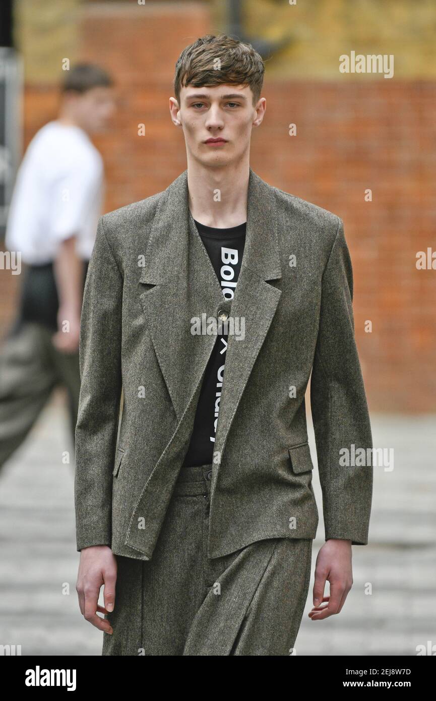 Model walks on the runway during the Hussein Chalayan show , London ...