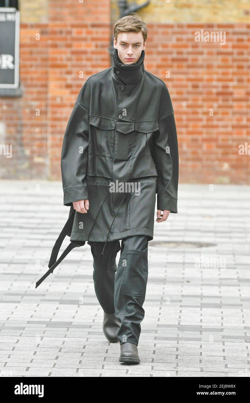 Model walks on the runway during the Hussein Chalayan show , London ...