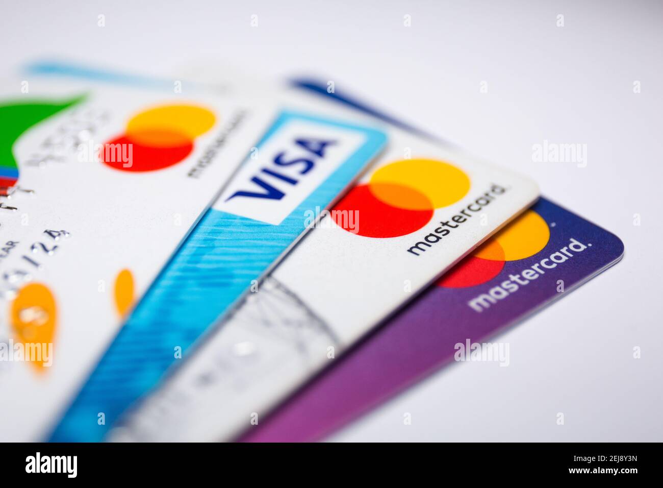 In this photo illustration a Visa credit card and Mastercard debit ...