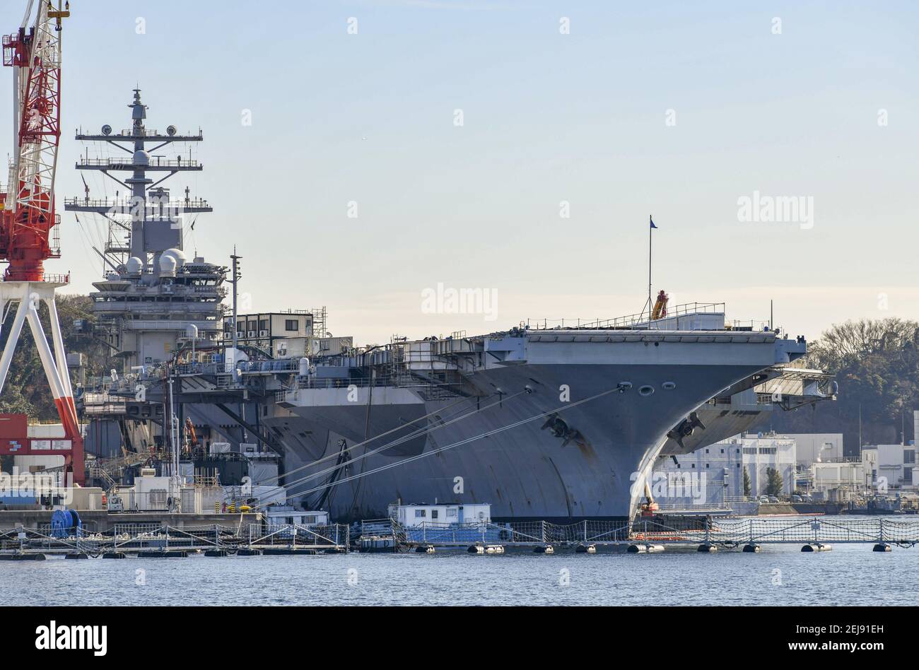 U.S. 7th Fleet USS Ronald Reagan (CVN 76) carrier is moored at port in ...