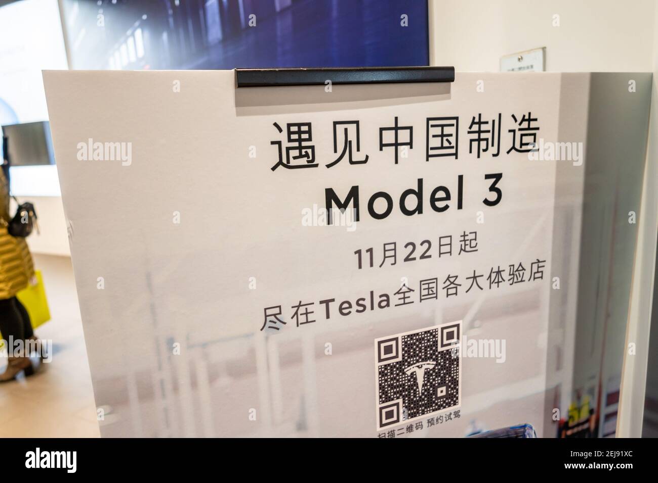 An advertising poster for the domestically-manufactured Tesla Model 3 ...