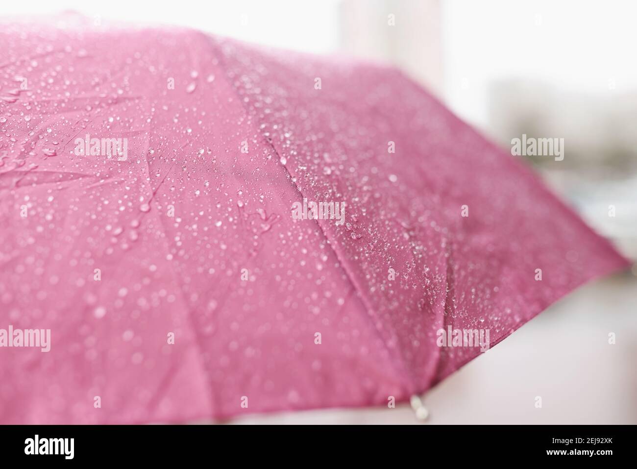 Rain drops running down umbrella hi-res stock photography and images ...