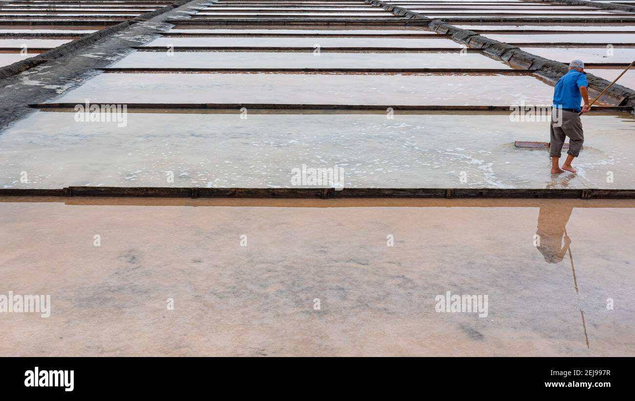 Different types of salt in salt pans with salt harvesting pools Stock ...