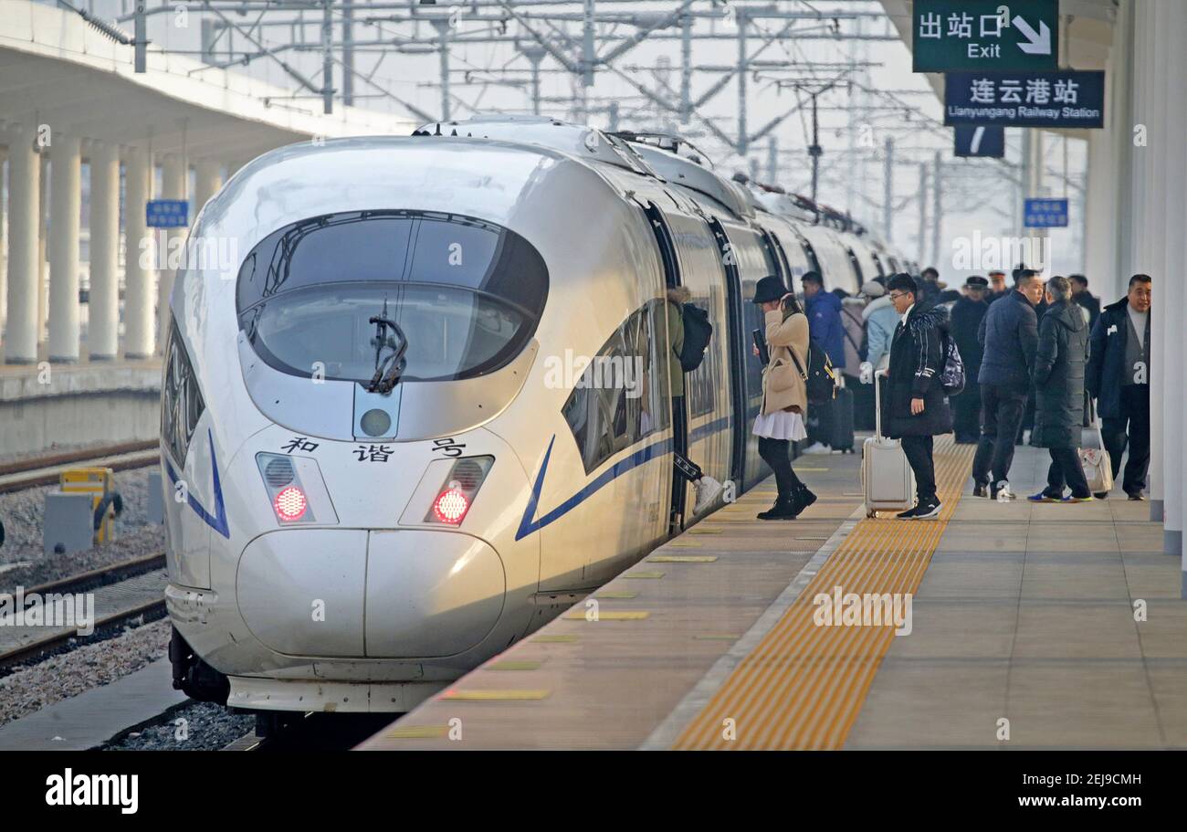 Chinese passengers board a CRH (China Railway High-speed) bullet train ...