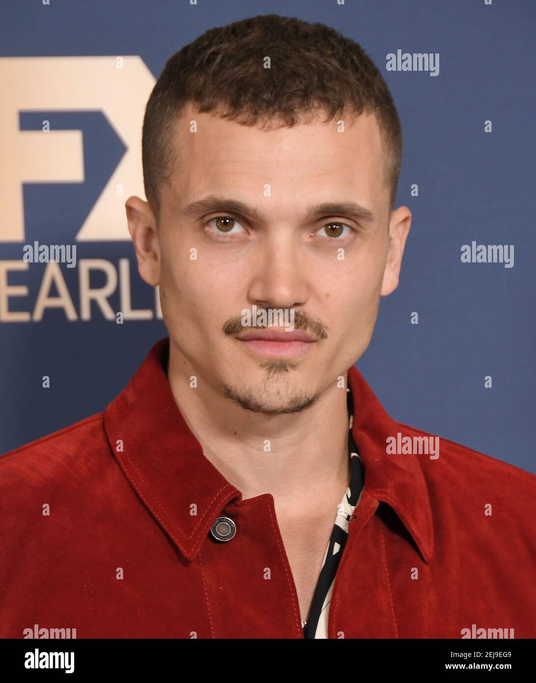 Karl Glusman arrives at the FX Networks Winter TCA Starwalk held at The ...