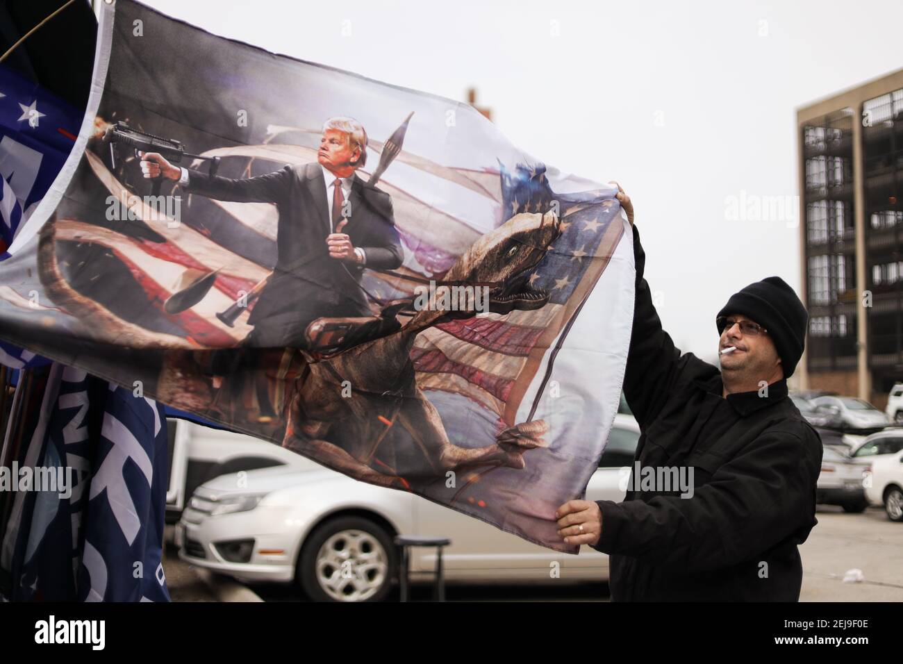 A Man Holds A Trump Flag Outside The Huntington Center Before Trumps
