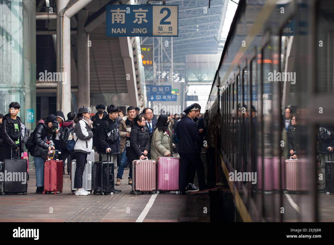Passengers prepare to travel by bus at nanjing railway station on ...