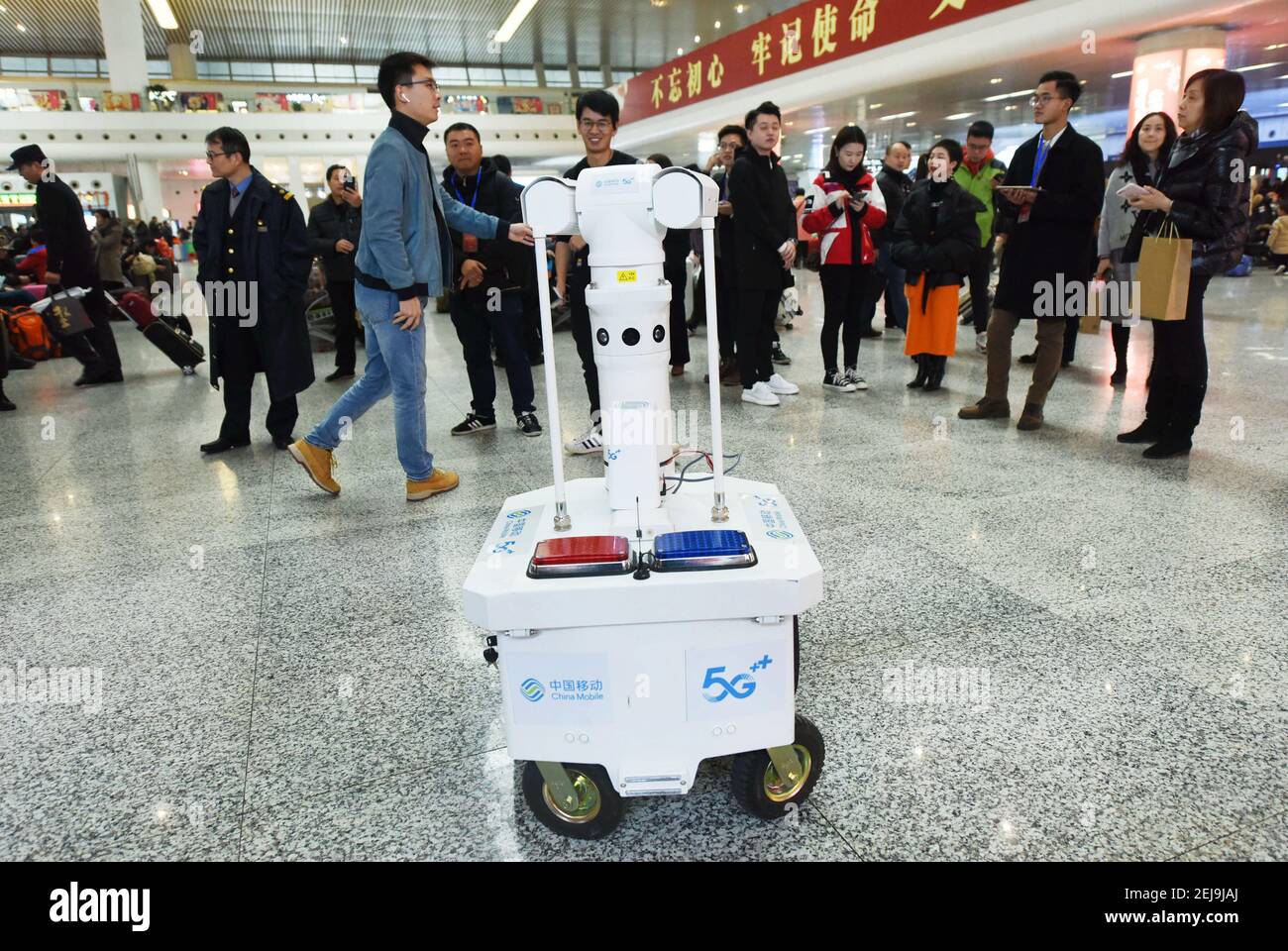 A police robot powered by the 5G wireless service of China Mobile ...