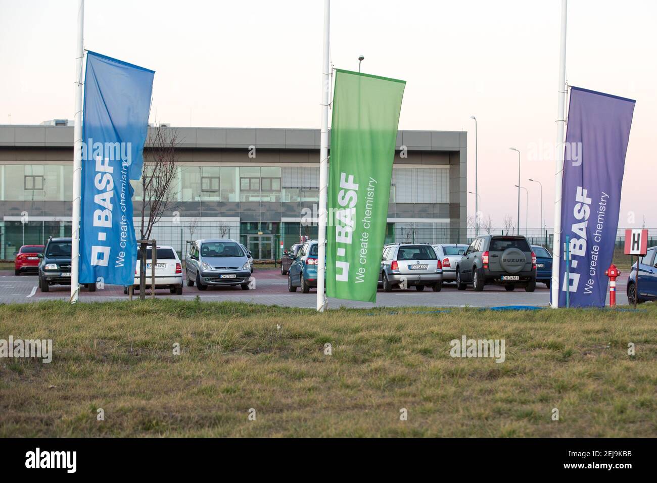 Flags with BASF logo seen in front of the biggest BASF catalyst ...