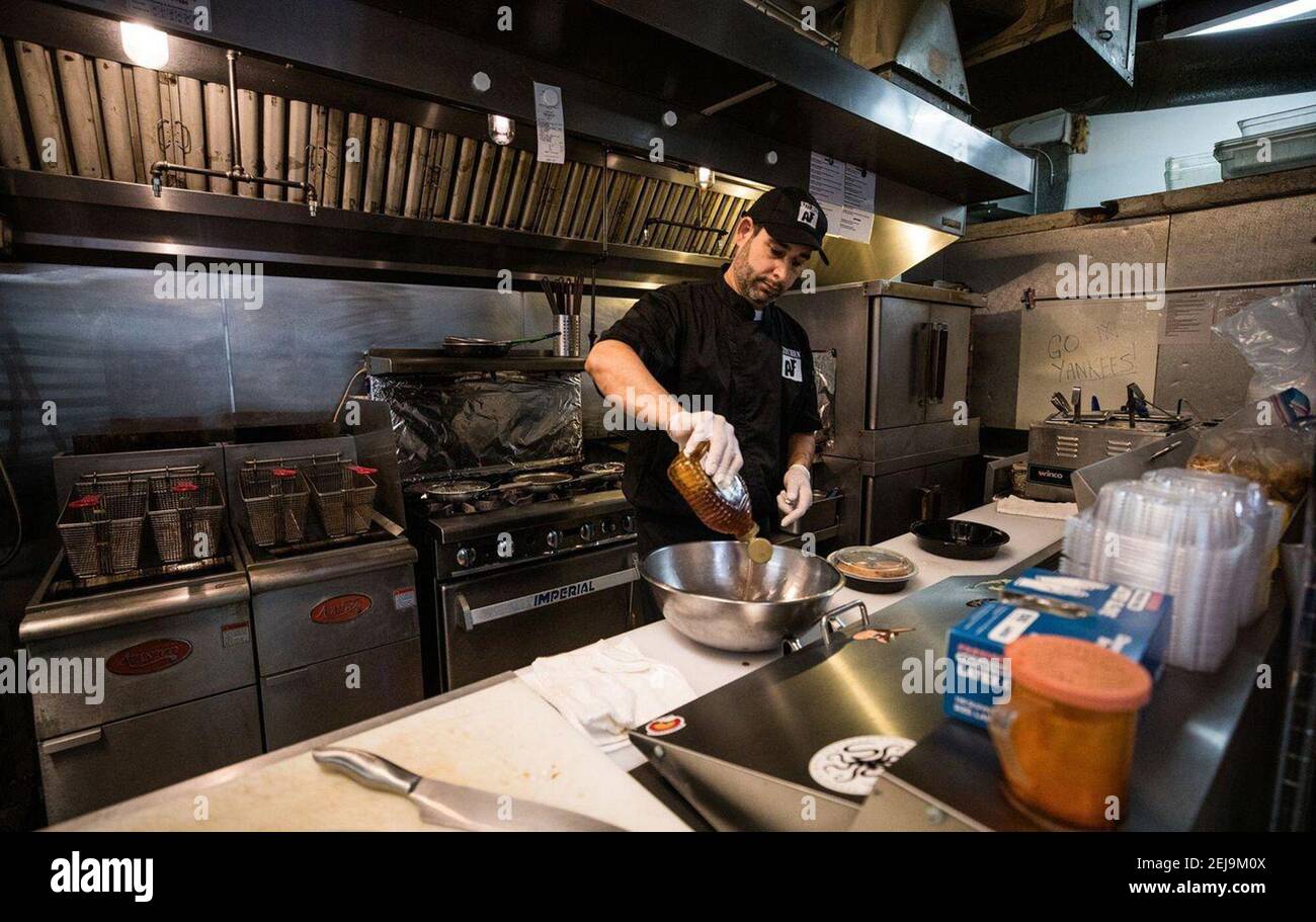 Dan Weber works in KitchenAF, a Central Florida ghost kitchen. (Photo ...